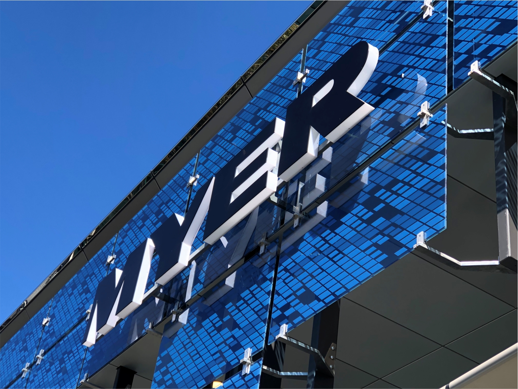 LARGE SCALE BUILDING SIGNAGE - Signs & Lines