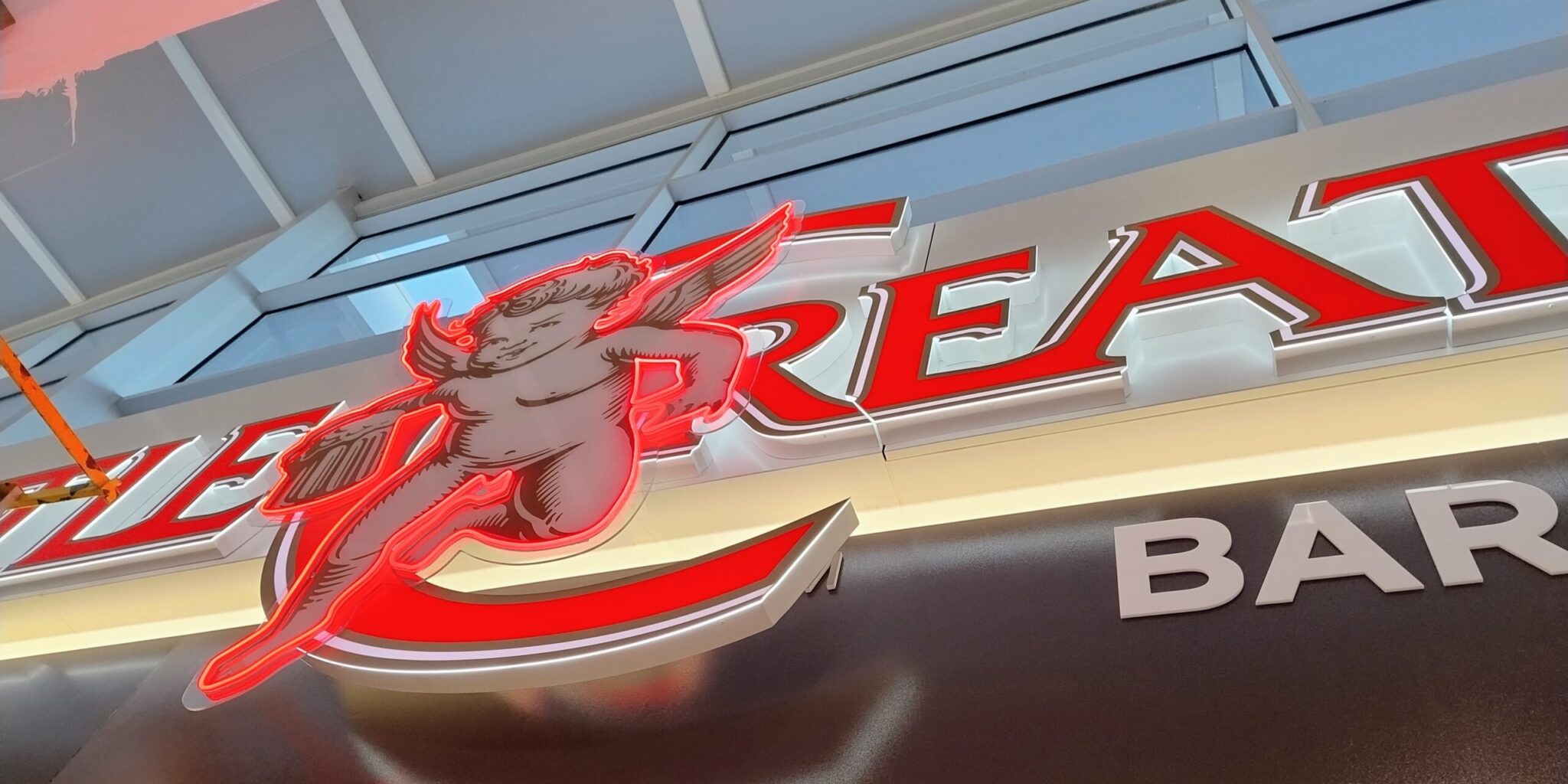 ILLUMINATED RETAIL SIGNAGE - CHERUBS! - Signs & Lines