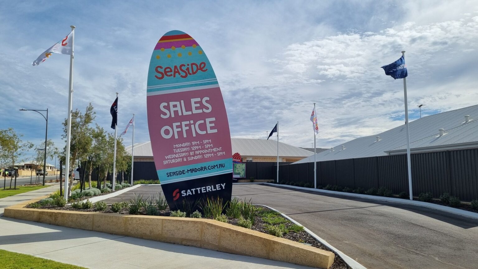 SURFBOARD SIGNAGE AT SEASIDE - Signs & Lines