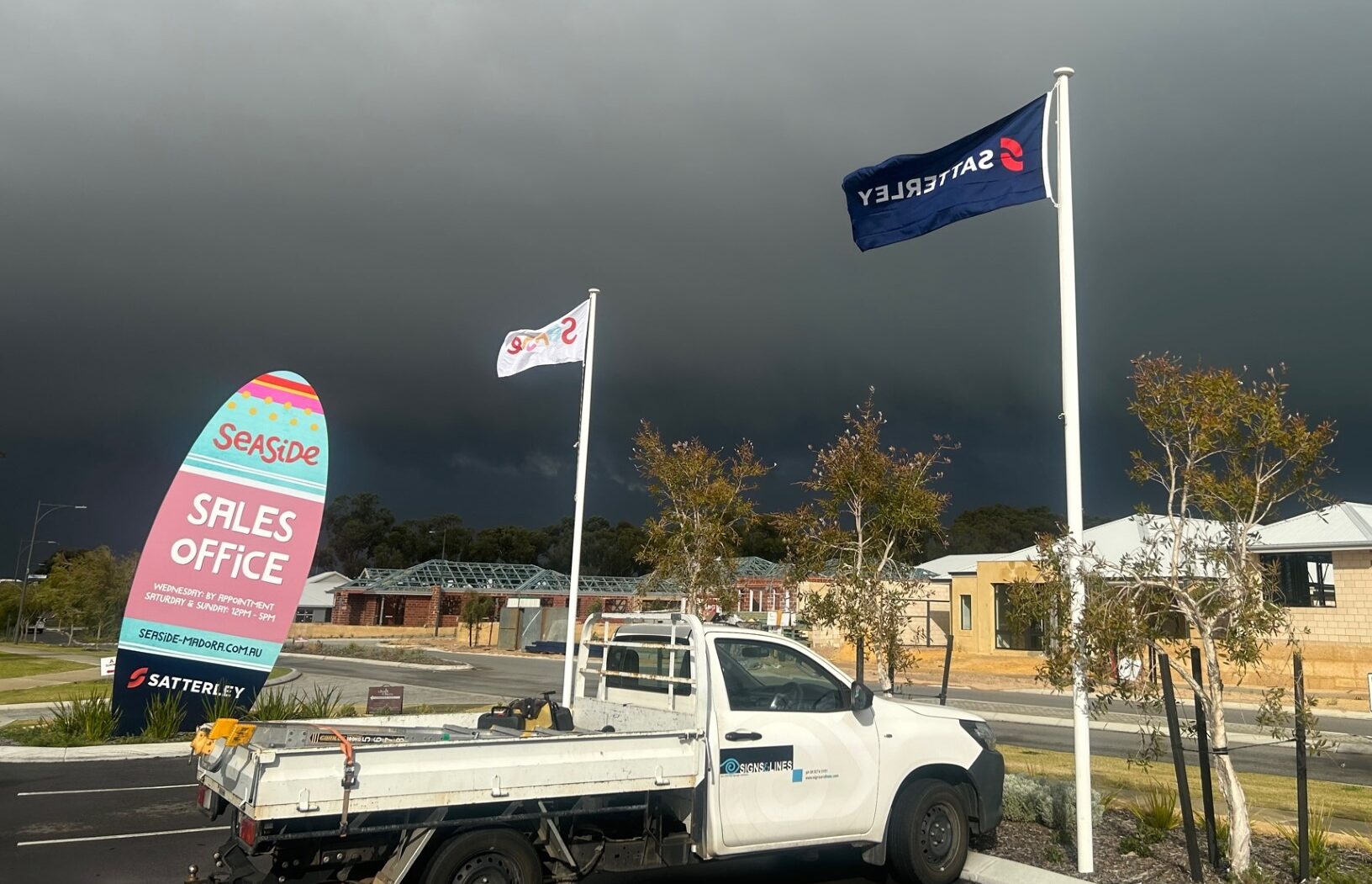 SURFBOARD SIGNAGE AT SEASIDE - Signs & Lines